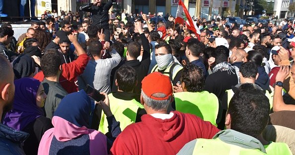 Citizens in Lebanon take to the streets to protest dire economic ...